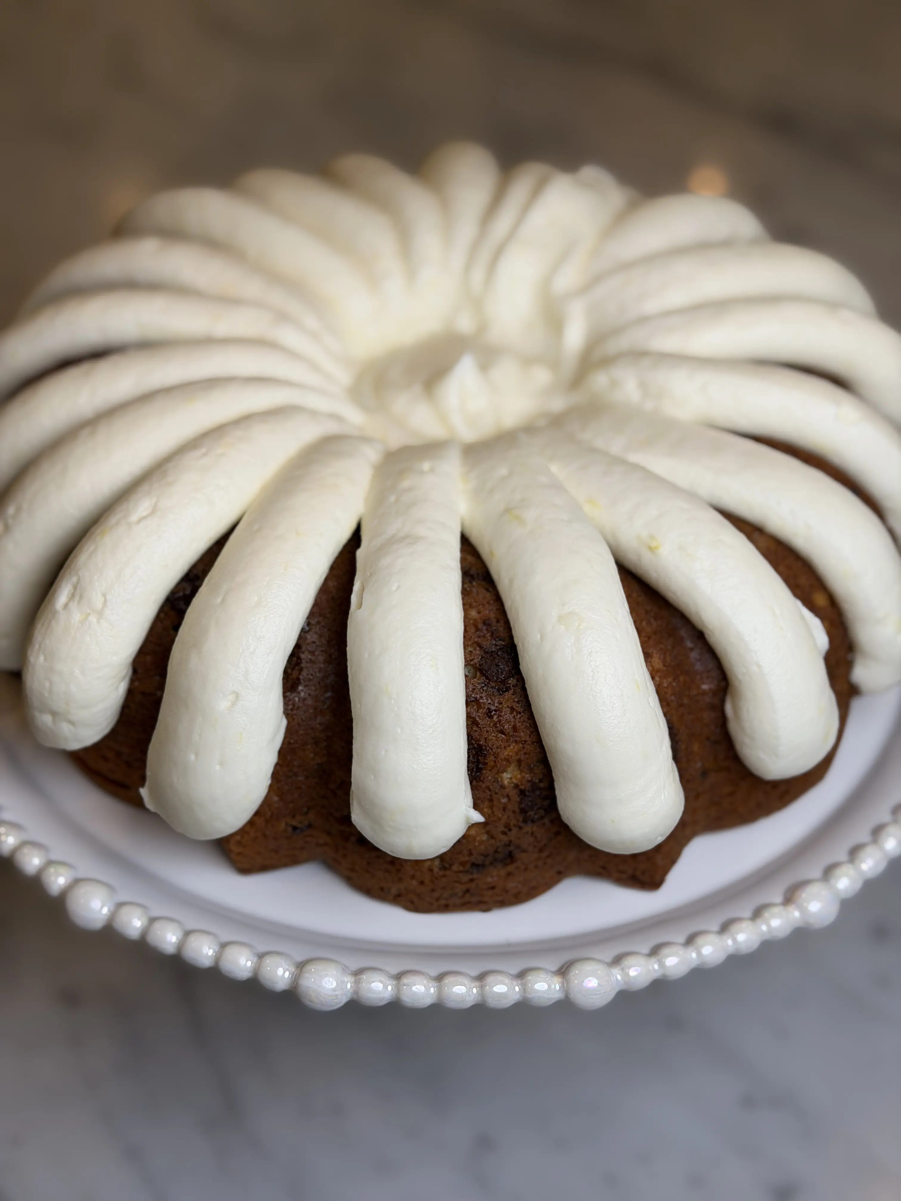 raspberry bundt cake with lemon cream cheese frosting